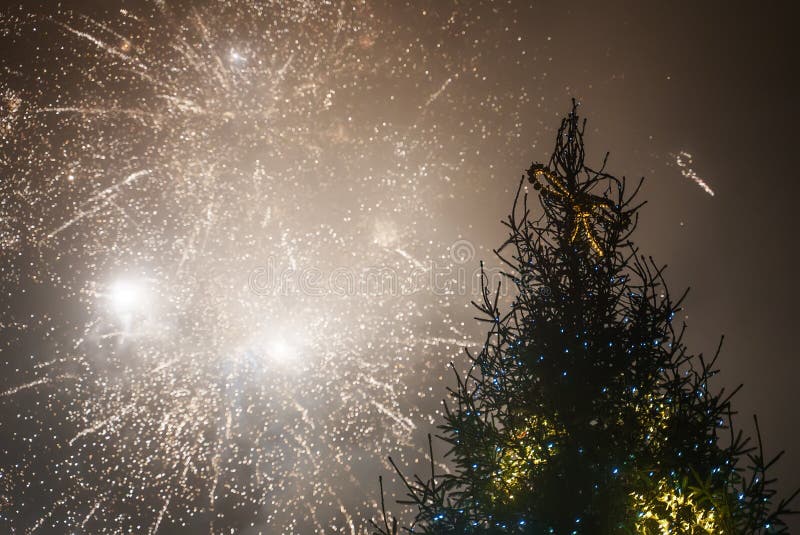 Decorated Christmas Tree and Fireworks Stock Image - Image of night ...