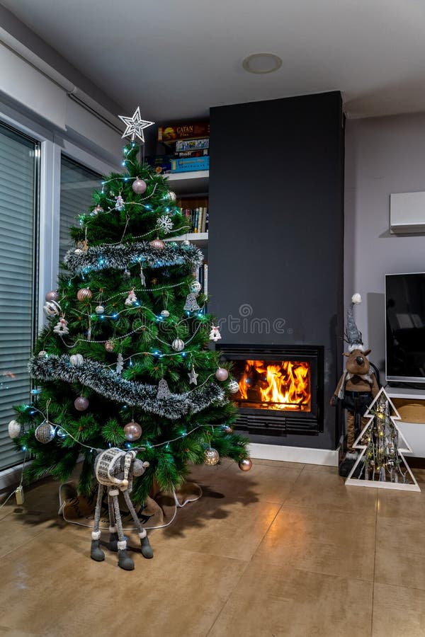 Decorated Christmas Tree in the Living Room with a Fireplace Stock ...