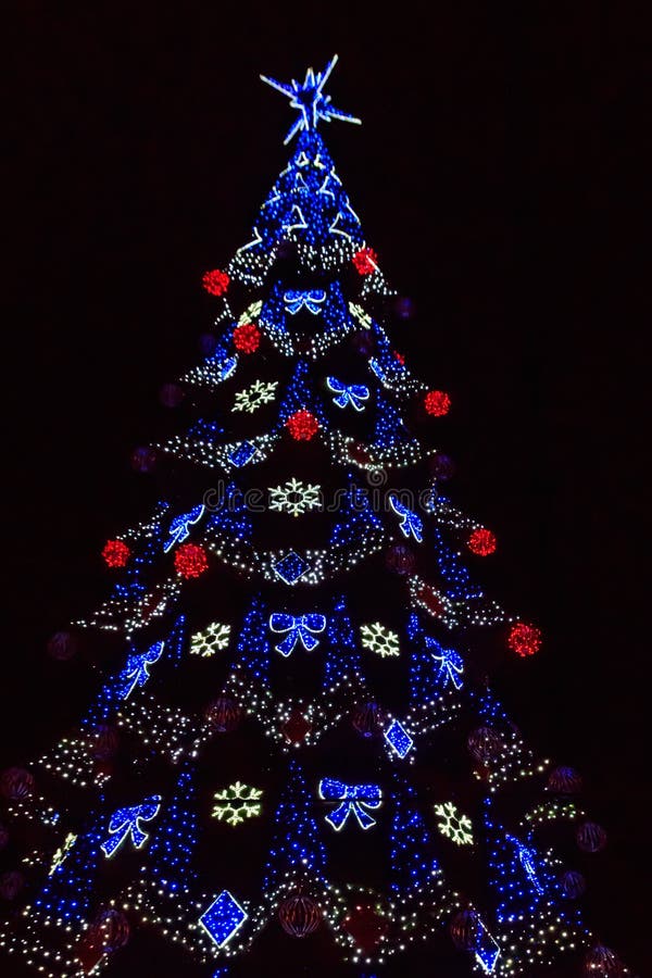 Decorated Christmas Tree with Multi-colored Lights at Night Stock Photo ...