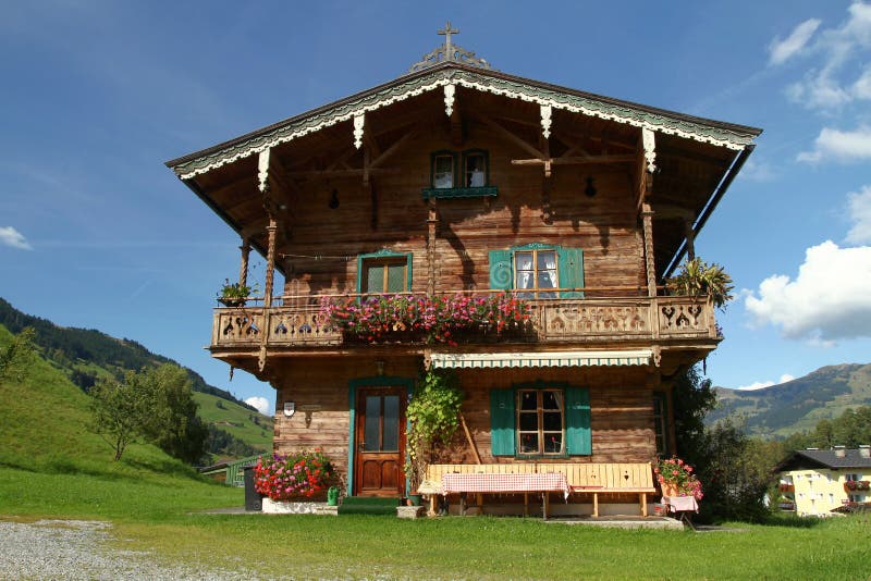 Decorated cottage stock image. Image of bench, flower - 49516977