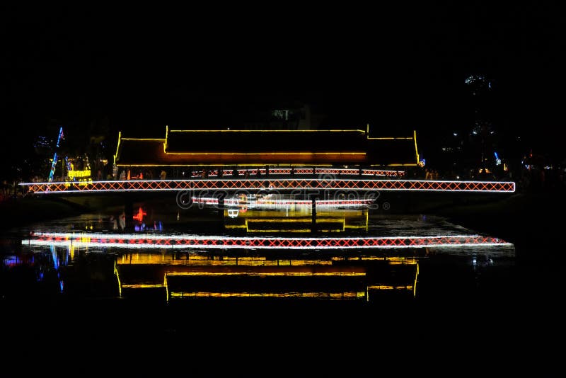 Decorated with Decorative Lights, the Bridge is Thrown Across a Small ...