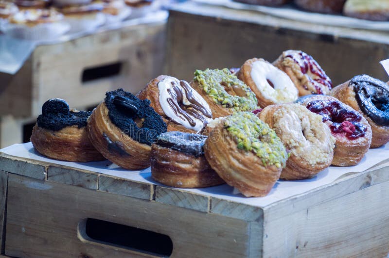 Decorated Doughnut on Display in Market Stock Photo - Image of high ...