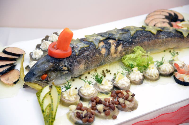 Decorated fish on a plate stock image. Image of fishing - 48396159