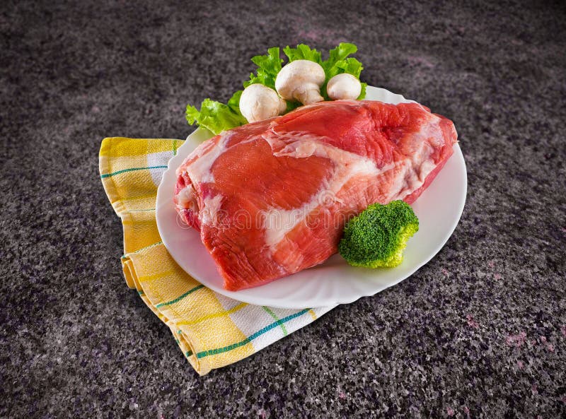 Decorated Fresh Raw Meat - Ham with Mushrooms and Clipping Path Stock ...