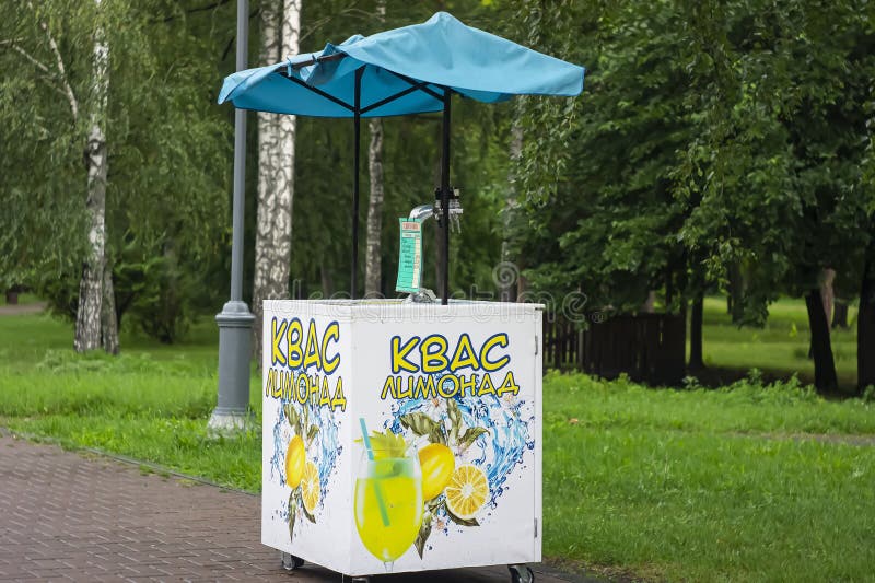 Decorated Lemonade Stand in Park. Summer Refreshing Natural Drink ... Decorated Lemonade Stand in Park. Summer Refreshing Natural Drink ...