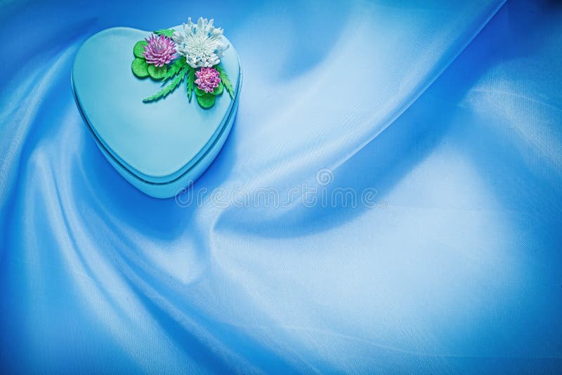 Decorated Present Box on Blue Fabric Background Holidays Concept Stock ...