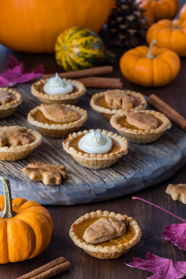 Decorated Pumpkin Pie Tarts Surrounded by Fall Decorations. Stock Image ...