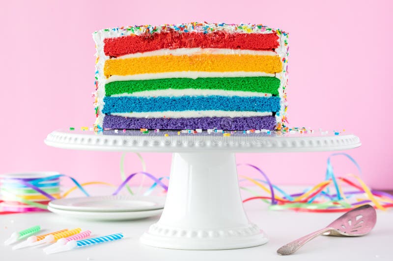 A Decorated Rainbow Cake on a Pedestal Stand, Ready for Serving. Stock ...