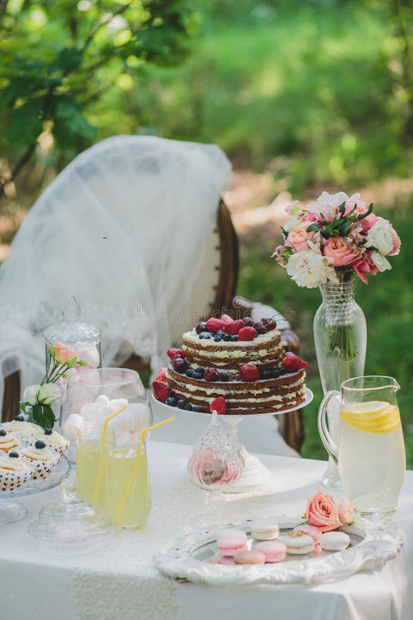 Decorated Sweet Table for Summer Wedding Picnic with Sweets, Cup Stock ...
