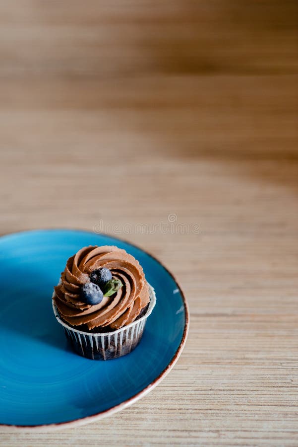 Decorated Tasty Cupcake with Slice of Strawberry and Chocolate on the ...