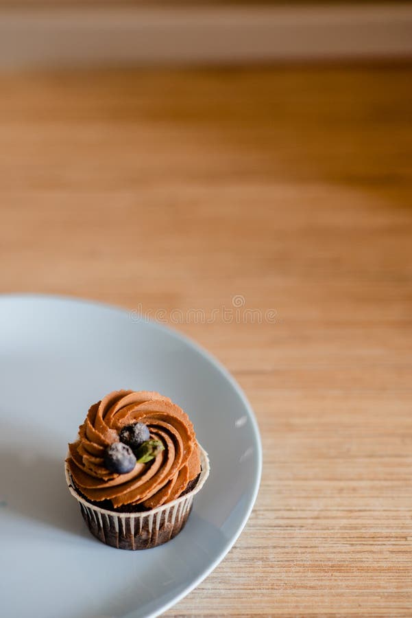 Decorated Tasty Cupcake with Slice of Strawberry and Chocolate on the ...