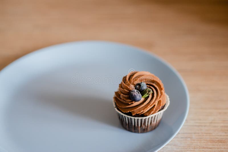Decorated Tasty Cupcake with Slice of Strawberry and Chocolate on the ...