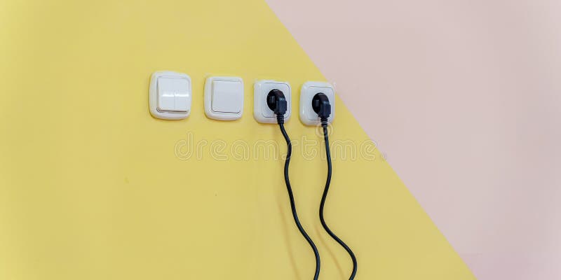 Decorated Wall Featuring Electrical Sockets and Cables Against a ...