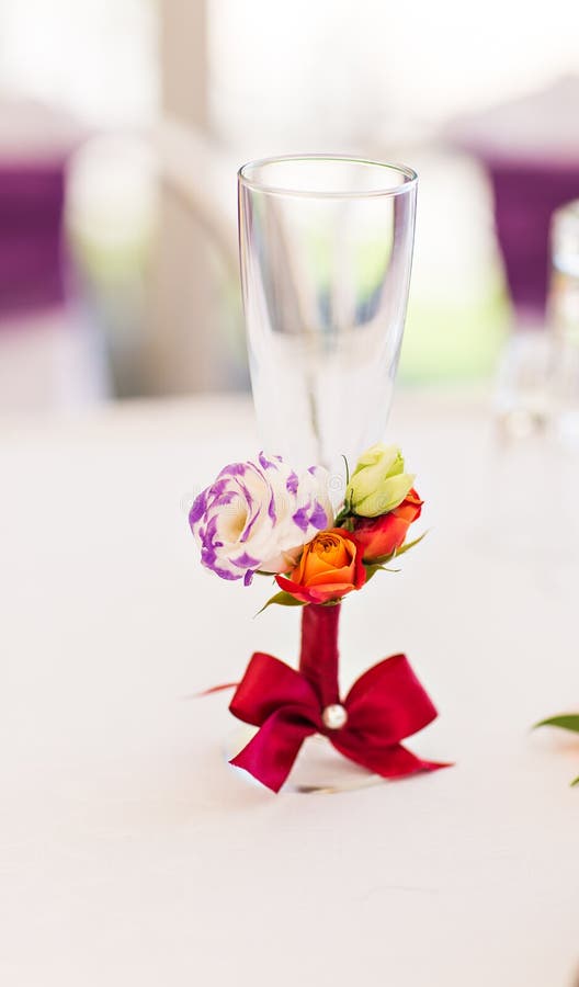 Decorated Wedding Glass with a Red Ribbon Bow Stock Photo - Image of ...