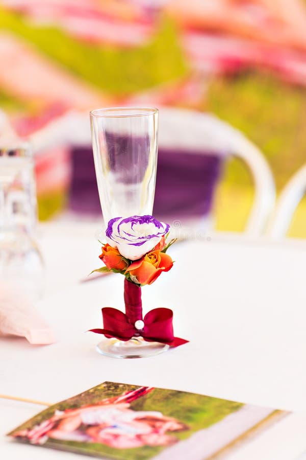 Decorated Wedding Glass with a Red Ribbon Bow Stock Photo - Image of ...