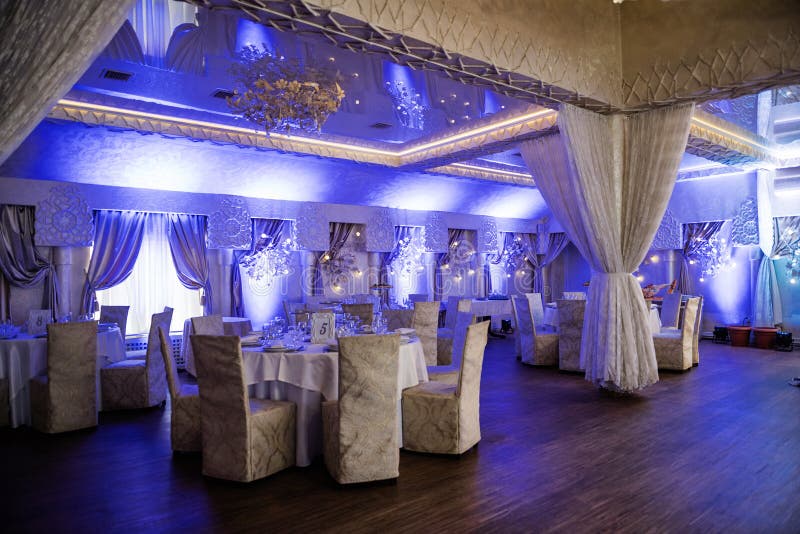 Decorated Wedding Hall with Dance Floor and Blue Light Stock Photo ...