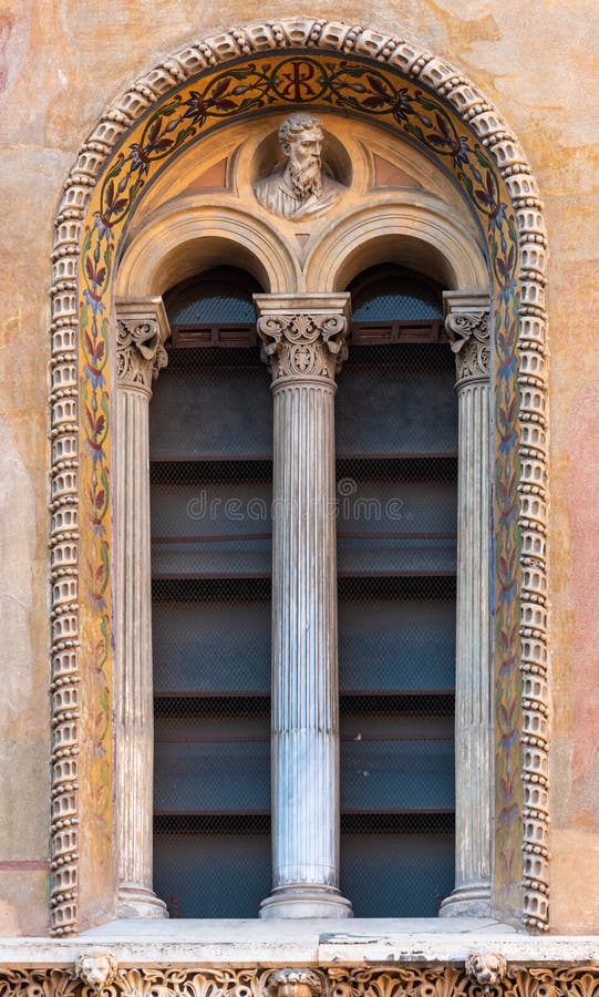 Decorated Window with Arch and Marble Columns in the Facade of Old ...