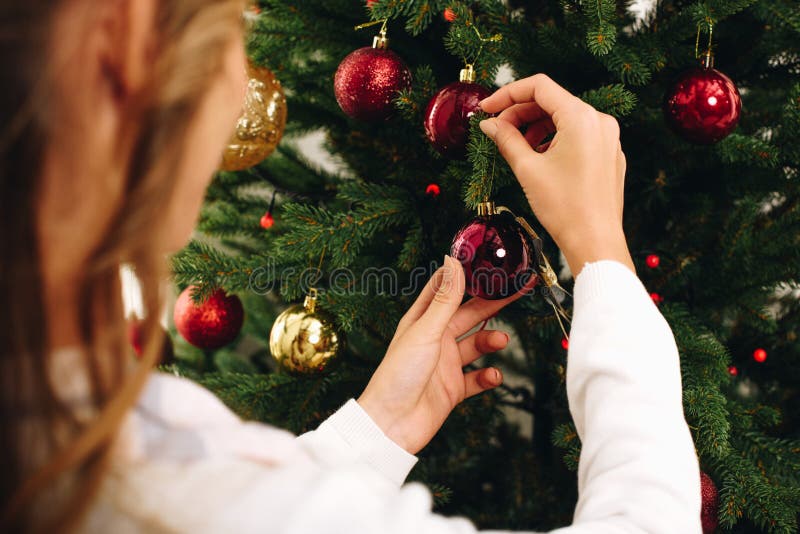 Decorating christmas tree stock image. Image of happy - 100646901