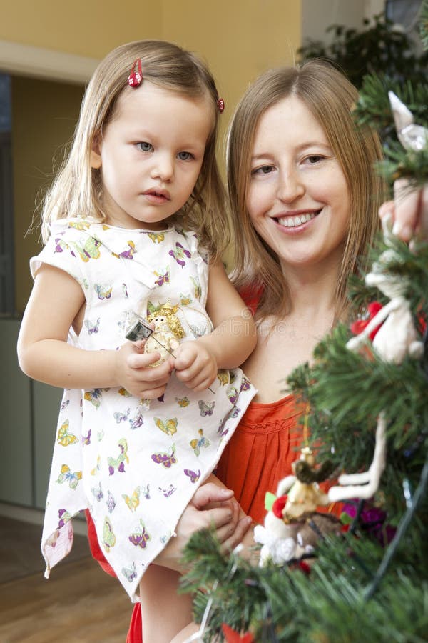 Decorating Christmas Tree at Home Stock Photo - Image of smile, claus ...