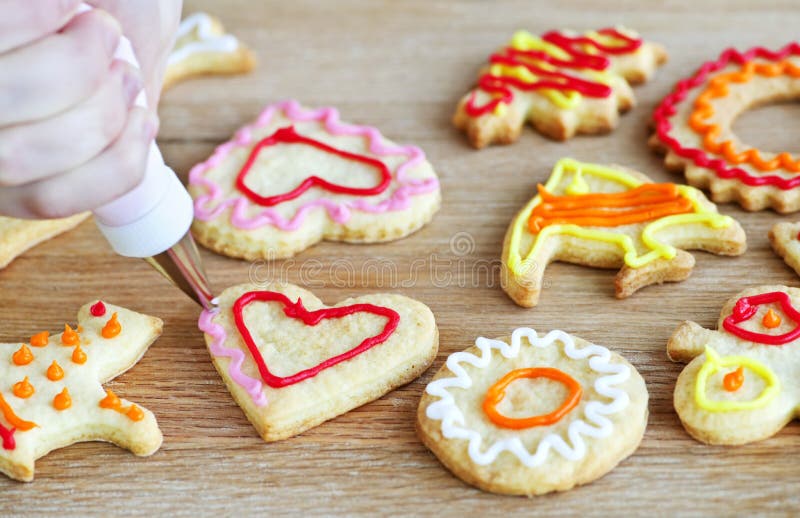Decorating cookies stock image. Image of baked, fingers - 13197039