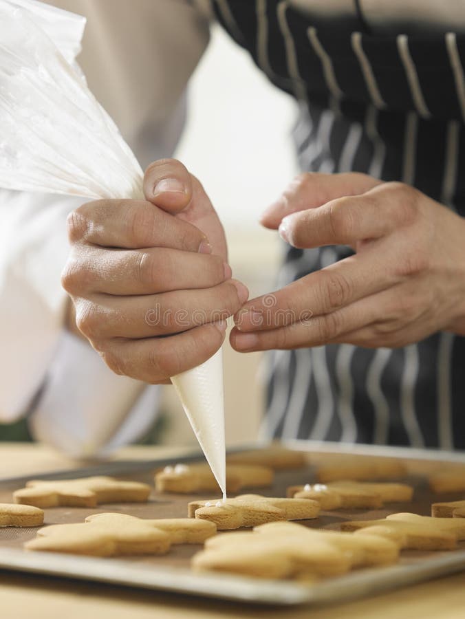 Decorating Ginger Bread Man Stock Image - Image of adult, baking: 33669653