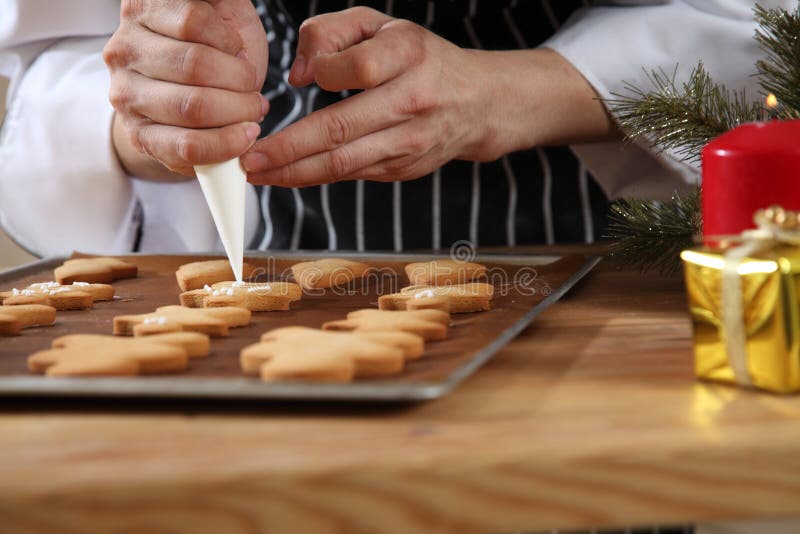 Decorating Ginger Bread Man Stock Image - Image of holiday, person ...