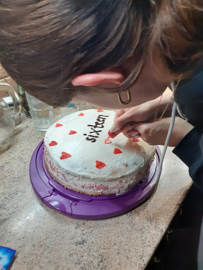 Decorating Homemade Birthday Cake Stock Photo - Image of doityourself ...