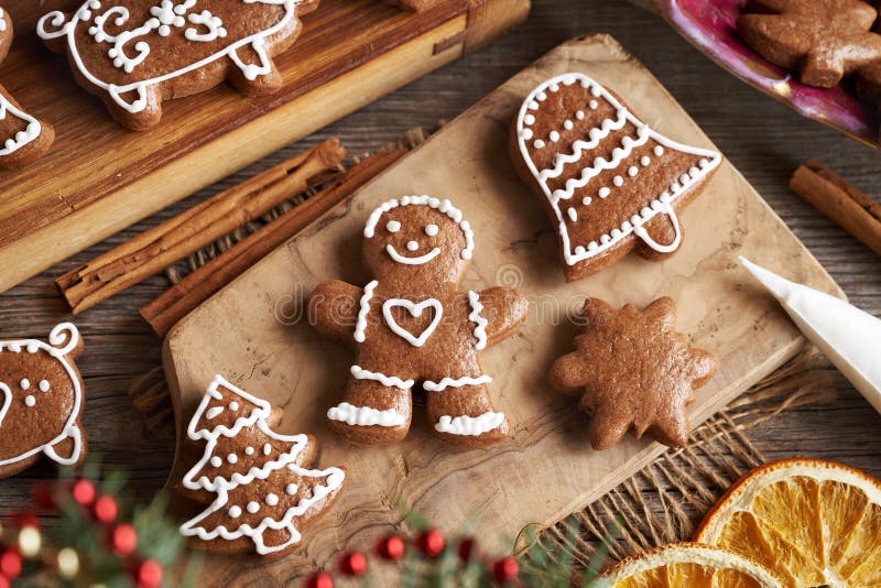 Decorating Homemade Gingerbread Christmas Cookies with White Icing, Top ...