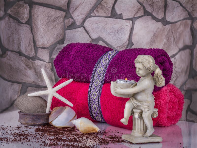 Decoration of Bathroom with Angel, Shells and Set Towels on the Stock ...