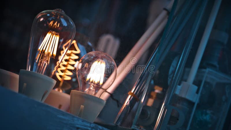 Sparkling Light Bulb in Cup Stock Photo - Image of festival ...