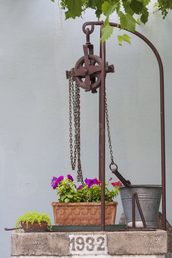 Decoration on old well. stock photo. Image of traditional - 95910602