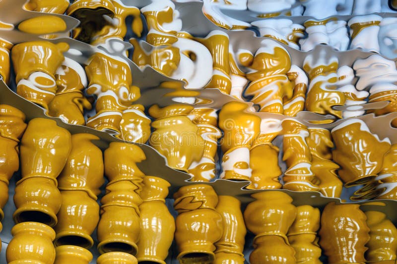 Decoration Wall Full of Ceramic Vases, Yellow and White Stock Image ...