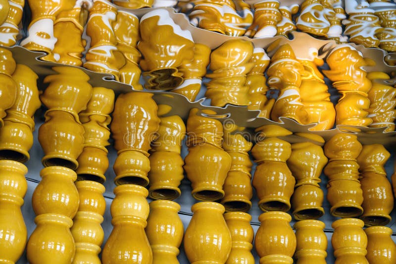 Decoration Wall Full of Ceramic Vases, Yellow and White Stock Photo ...