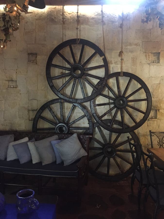 Decoration Wheels on a Wall Stock Image - Image of arch, iron: 178592463