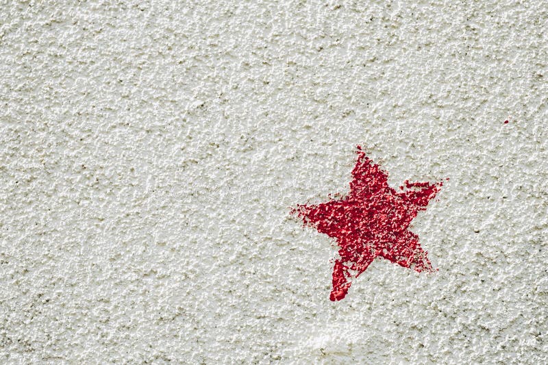 Decoration on a White Wall with a Star Painted in Red Stock Image ...