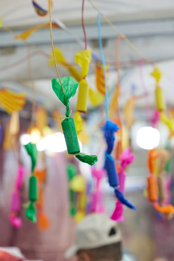 Decorations Under the Ceiling of a Tent Selling Churros Imitating ...