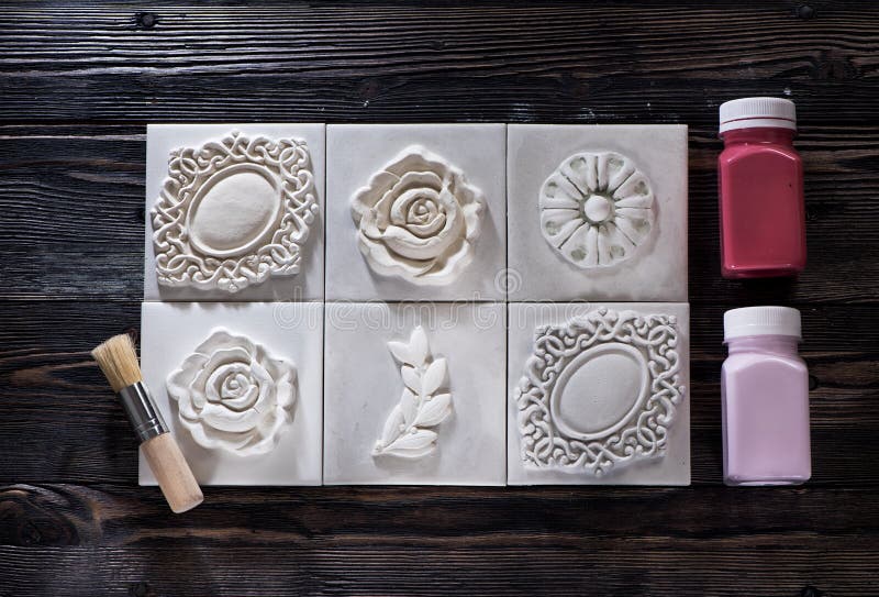 Decorations from White Plaster Relief Stucco, Brushes, Paint for ...