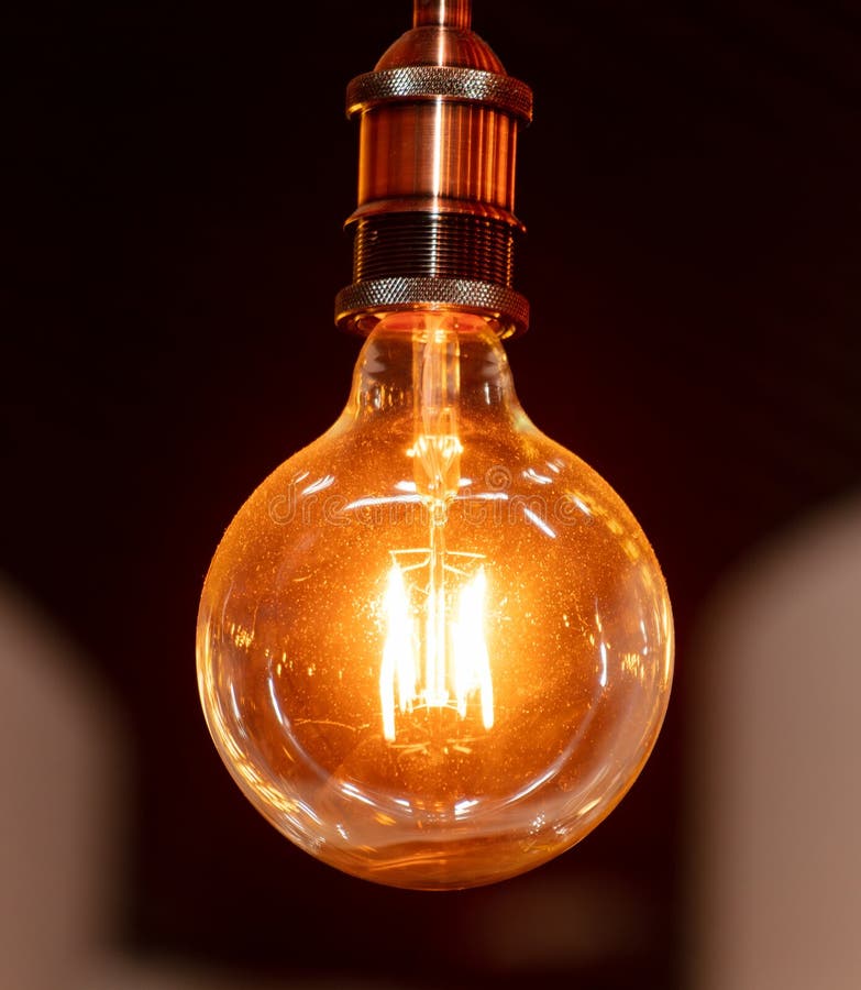 Decorative Antique Edison Style Filament Light Bulbs Hanging from ...