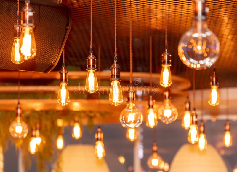 Decorative Antique Edison Style Filament Light Bulbs Hanging from ...