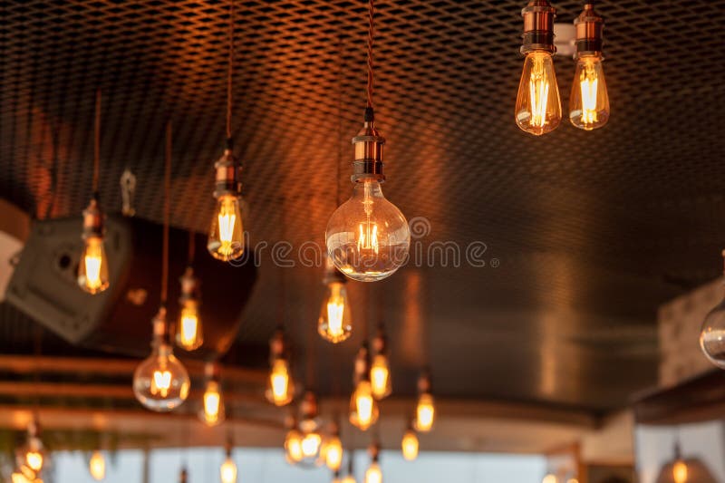 Decorative Antique Edison Style Filament Light Bulbs Hanging from ...