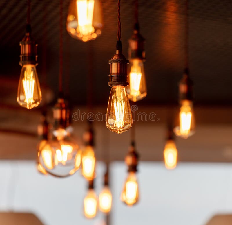 Decorative Antique Edison Style Filament Light Bulbs Hanging from ...