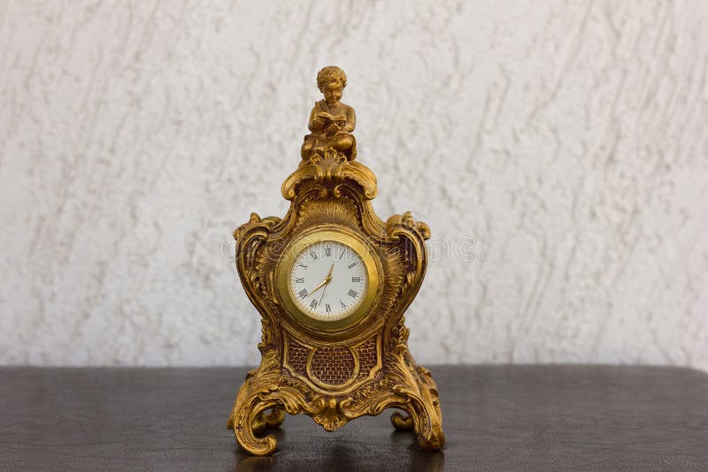 Decorative Antique Table Clock with a Roman Boy Statue Reading Book on ...