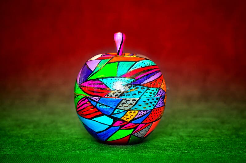 Decorative Apple, Made of Wood and Painted by Hand Paints Stock Image ...
