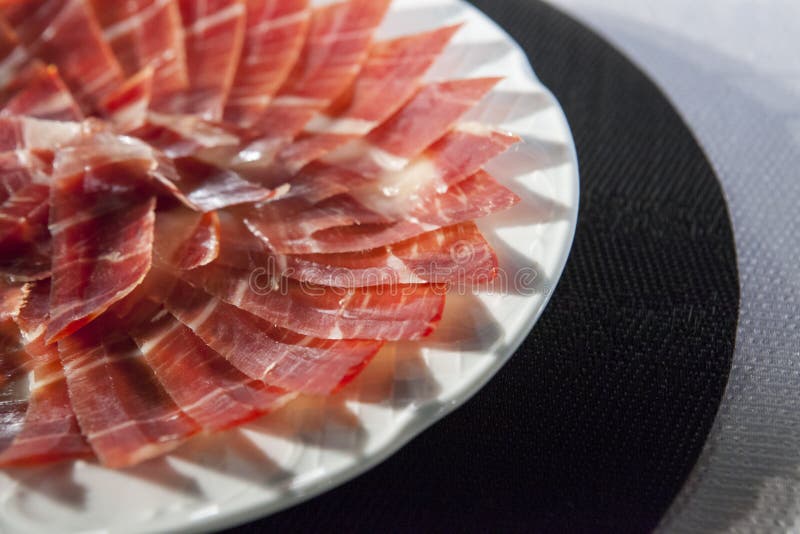 Decorative Arrangement of Iberian Cured Ham on Plate Stock Image ...