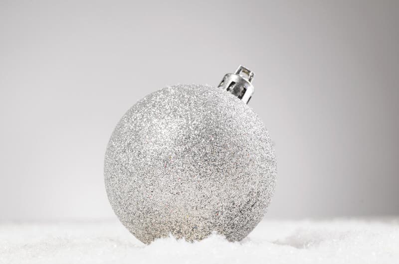 Red Decorative Ball on the Xmas Tree on Glitter Bokeh Background. Merry ...