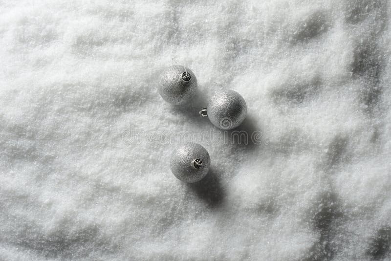 Decorative Balls in the Snow Stock Photo - Image of gray, background ...