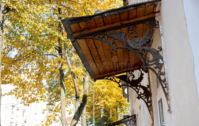 Decorative Birds in the Old Style Support the Roof Canopy Stock Image ...