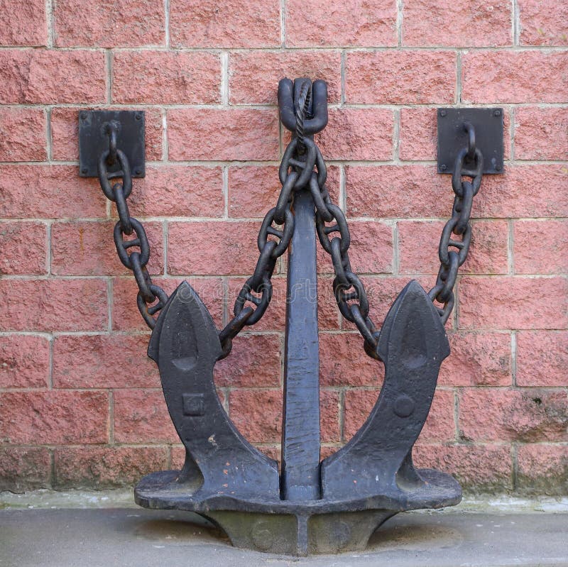 Decorative Black Metal Anchor Attached by Chains To the Pink Wall Stock ...