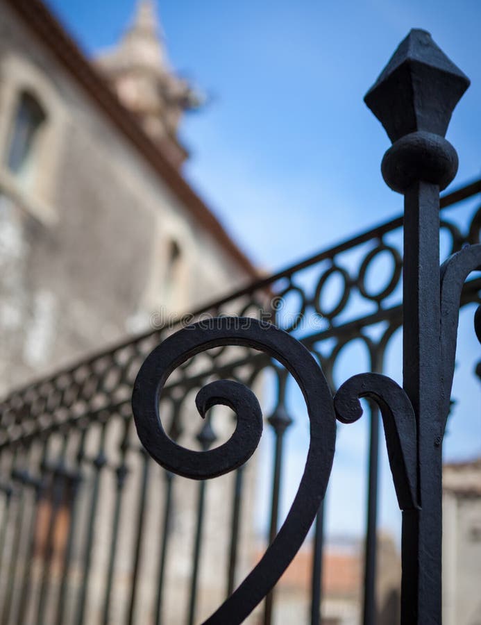Decorative Black Rod Iron Fence Post in Streets of Sicily Stock Image ...
