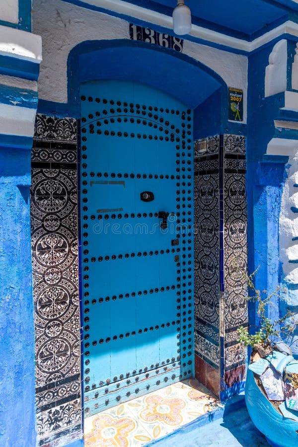 Decorative Blue Door with Intricate Designs and Colorful Entrance in ...